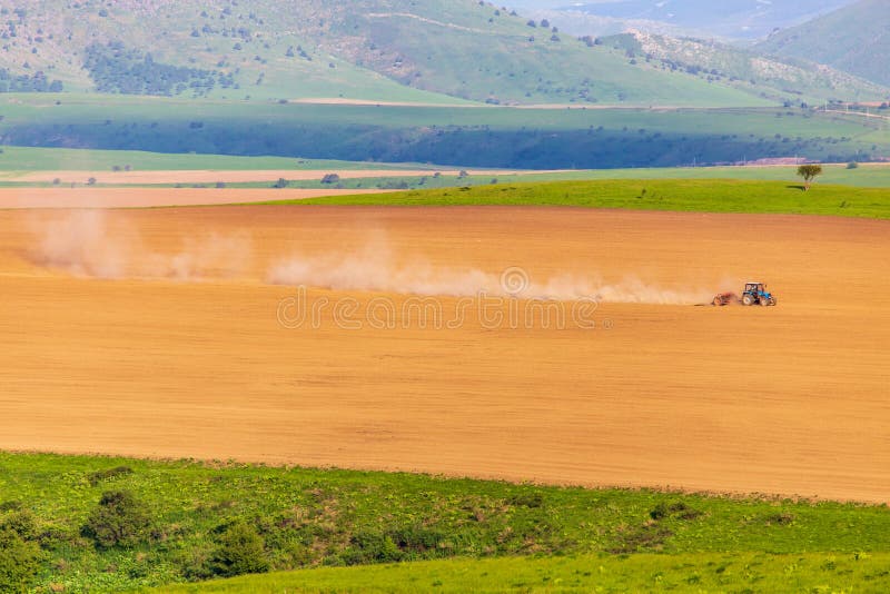 Dust from a Tractor Working in a Field in Spring Stock Photo - Image of ...