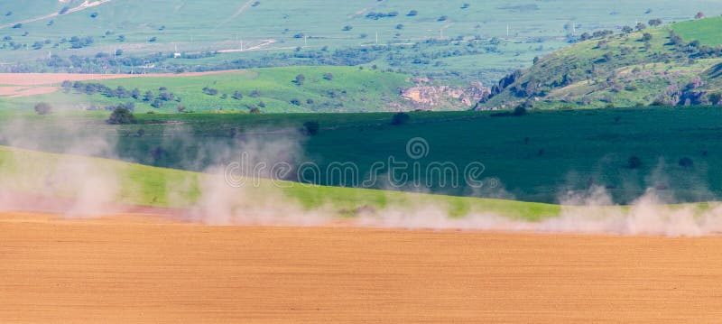 Dust from a Tractor Working in a Field in Spring Stock Image - Image of ...