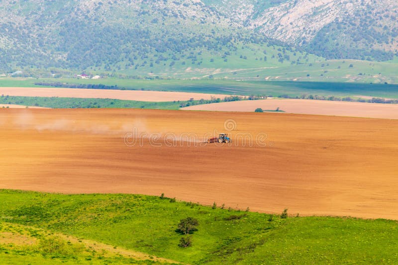 Dust from a Tractor Working in a Field in Spring Stock Photo - Image of ...
