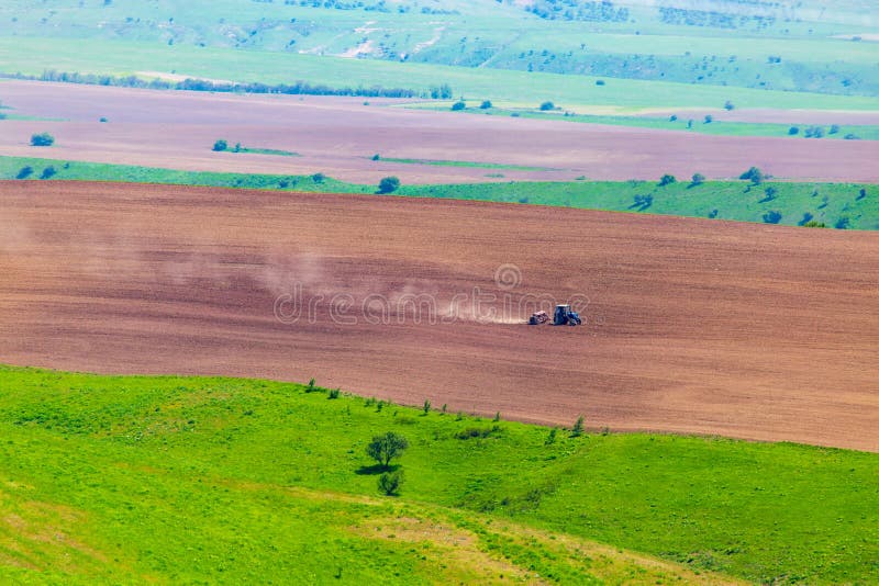 Dust from a Tractor Working in a Field in Spring Stock Photo - Image of ...