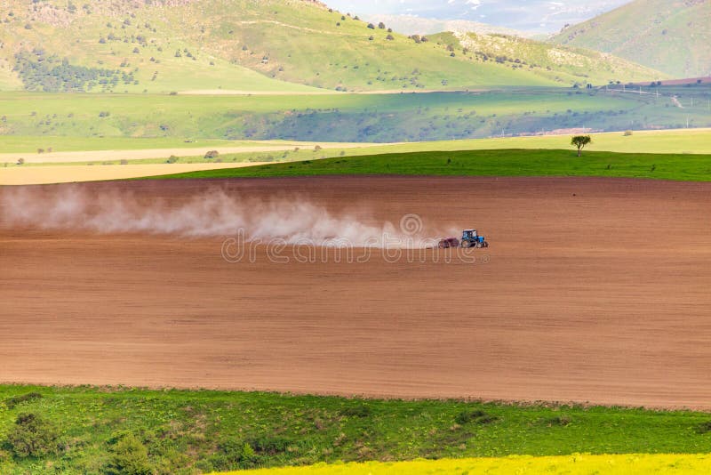 Dust from a Tractor Working in a Field in Spring Stock Image - Image of ...