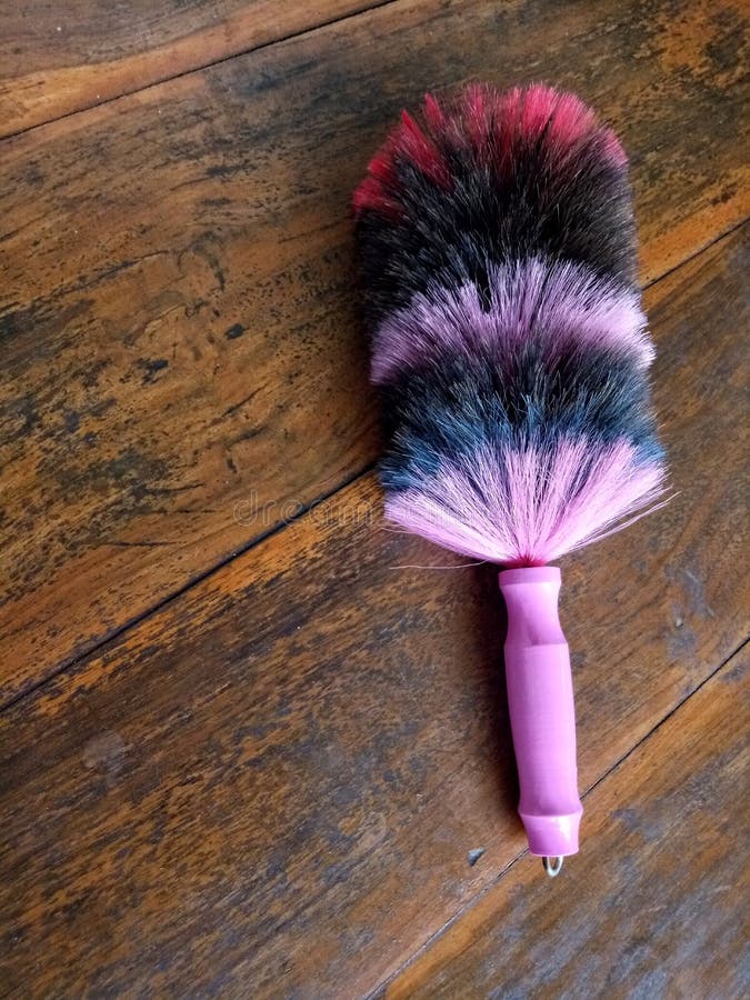 Duster on the table stock photo. Image of stick, colorful - 100368434