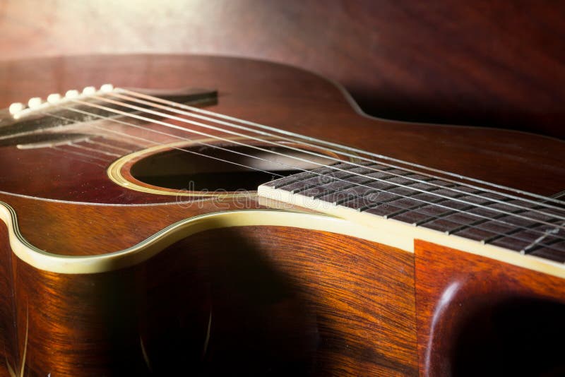 Old Dusty Acoustic Cutaway Guitar Stock Photo - Image of musical, dark ...
