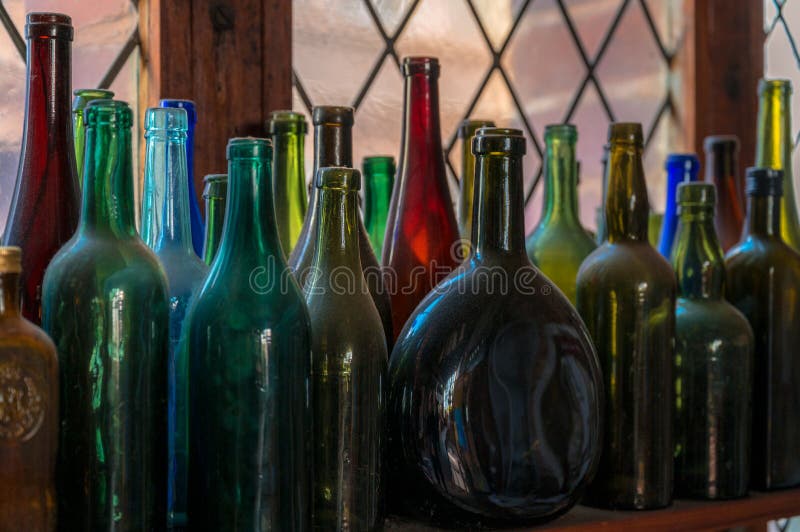 Dusty Bottles at the Window Stock Image - Image of decorative, drink ...