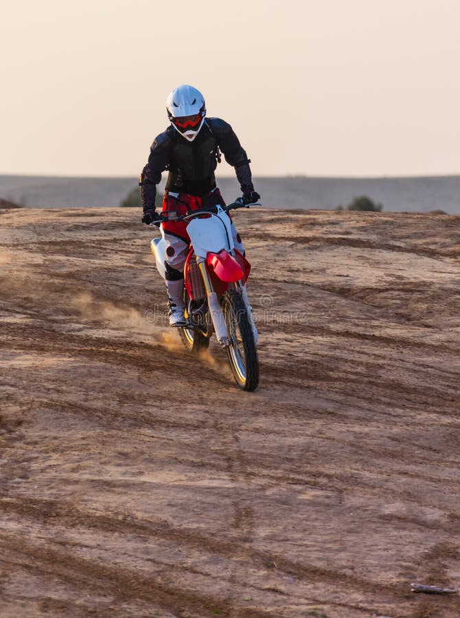 Dusty Desert Racer on a Motorcycle Stock Image - Image of danger, biker ...