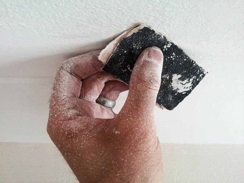 Dusty Hand Sanding a White Surface Stock Image - Image of sanding ...