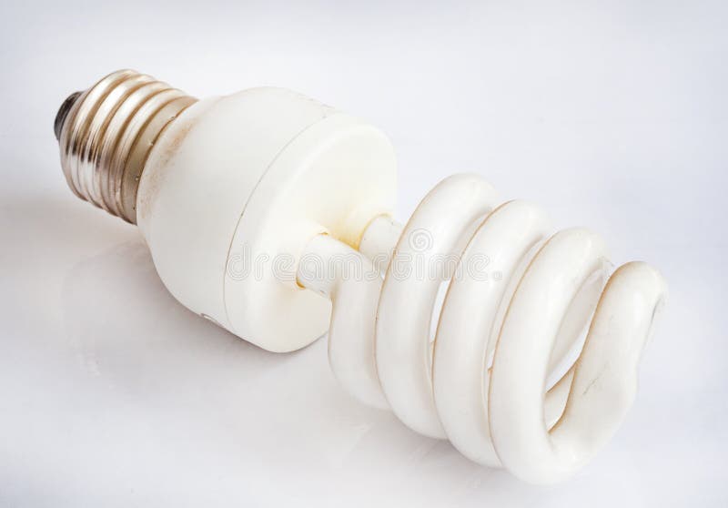 Dusty and Hardworking Power Saving Lightbulb Stock Image - Image of ...