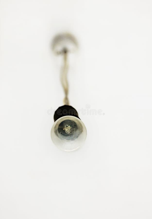 Dusty Light Bulb Hanging from the Ceiling/=. Stock Image - Image of ...