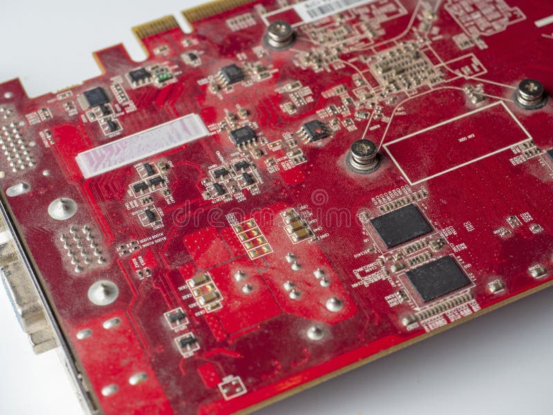 Dusty Printed Circuit Board with Red Chips. Old Video Card Stock Image ...