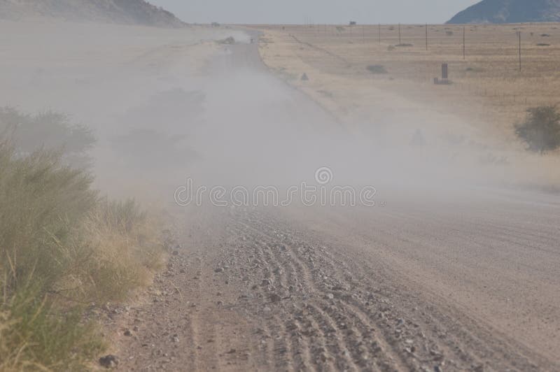 Dusty road in Namibia stock image. Image of dust, driving - 21538137