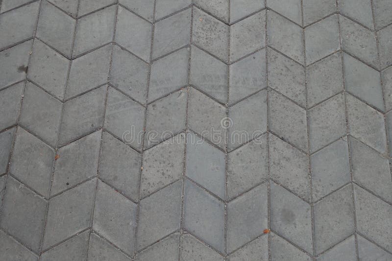Dusty Surface of Gray Diamond-shaped Concrete Pavement with Geometric ...