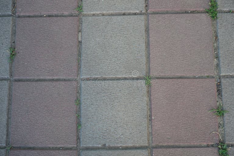 Dusty Surface of Stack Bond Brick-like Gray and Pink Concrete Pavement ...