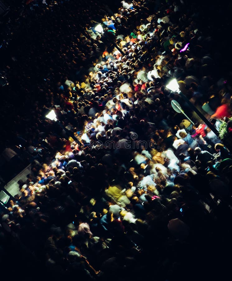 Dutch Angle of Long Exposure of Crowd at Night - High Perspective Stock ...