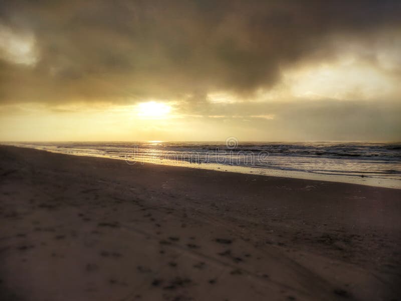 Beach scene sunset stock photo. Image of calm, shore - 106570898