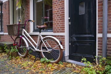 Dutch bike with basket stock image. Image of basket, architecture ...
