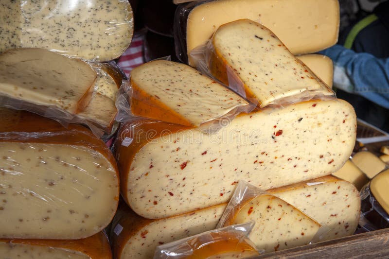Dutch cheese in plastic stock photo. Image of shop, snack - 162407516