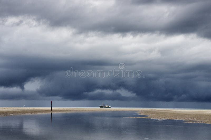 Dutch Clouds with Fishing Boat Stock Photo - Image of beachdutch, beach ...