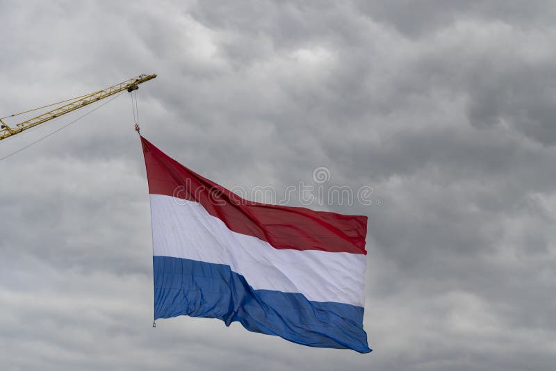 Dutch Flag Hoisted on a National Holiday Stock Photo - Image of blue ...