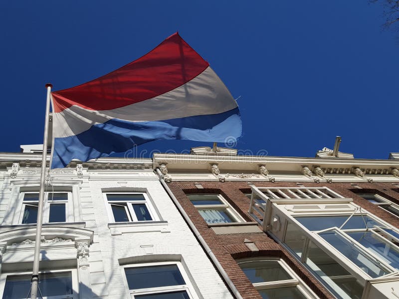 The dutch flag stock image. Image of amsterdam, building - 66946131