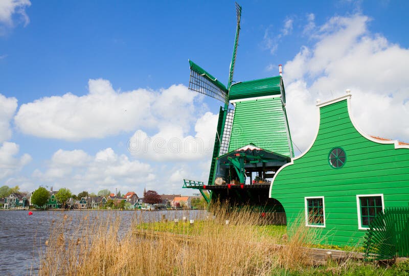 Dutch Green Windmills Over River Stock Image - Image of field, rural ...