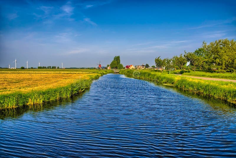 Dutch Landscape with a Canal and Grass Fields with Mirror Reflec Stock ...