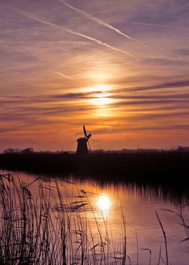 Windmill and sunset stock photo. Image of night, amsterdam - 337694010