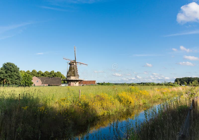 Dutch Landscape with Windmill Stock Photo - Image of morning ...