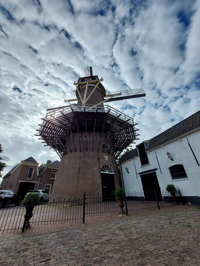 Dutch Mill Standing in the Middle of the Town Stock Photo - Image of ...