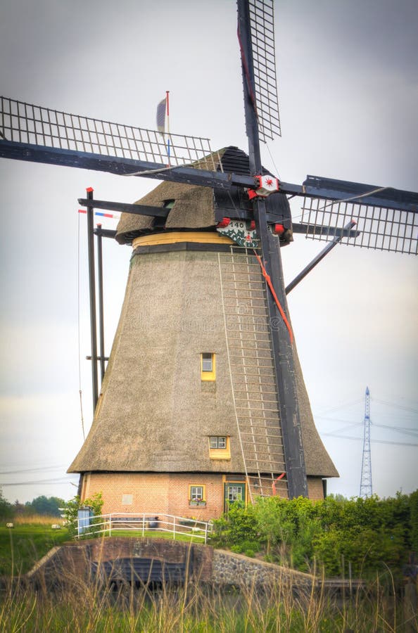 Dutch Mills in Kinderdijk, Netherlands Stock Photo - Image of grass ...
