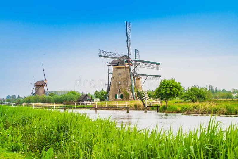 Dutch Mills in Kinderdijk, Netherlands Stock Photo - Image of grass ...