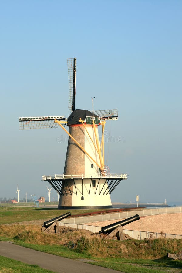 Dutch Tower Mill and Cannons Stock Image - Image of defending, cannon ...