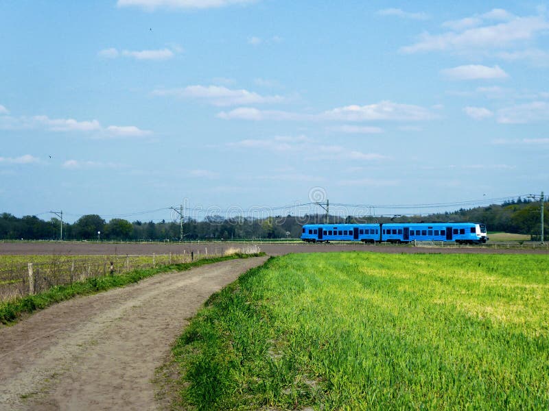 Dutch Valeilein Train. Blue Passenger Train. in Farmlands Editorial ...