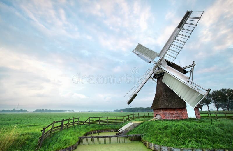 Dutch Windmill during Cloudy Summer Morning Stock Image - Image of farm ...