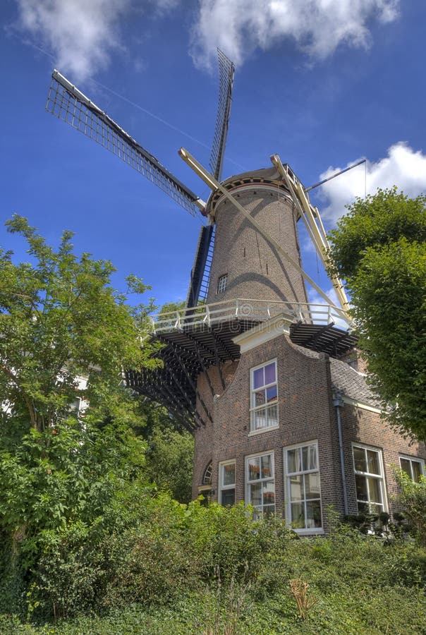 Windmill in Gouda, Holland stock photo. Image of scenic - 34755396