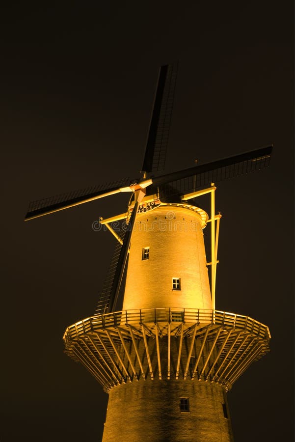 An Old Windmill in the Night with Clouds Stock Photo - Image of night ...