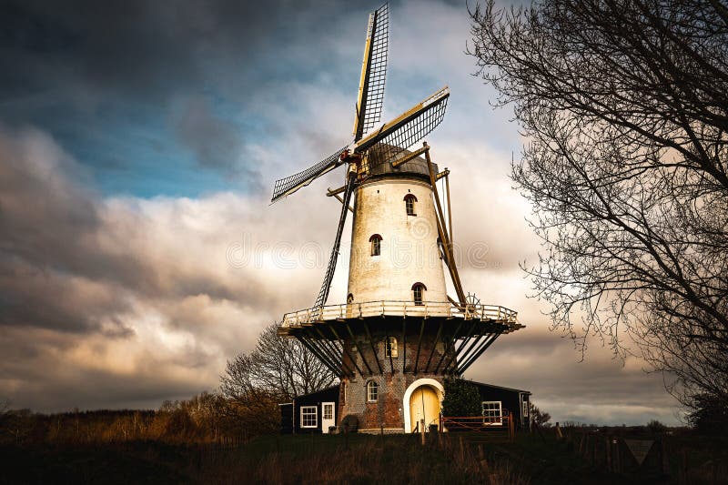 Dutch windmill stock photo. Image of black, stormy, nature - 272156490