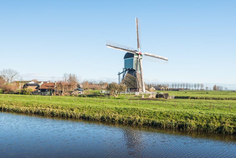 Dutch Windmill in a Polder Landscape Stock Image - Image of landmark ...