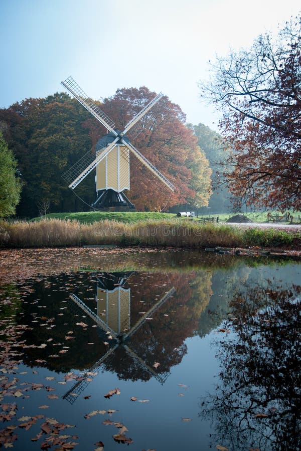 Dutch Post Windmill with Reflection in the Water Stock Photo - Image of ...