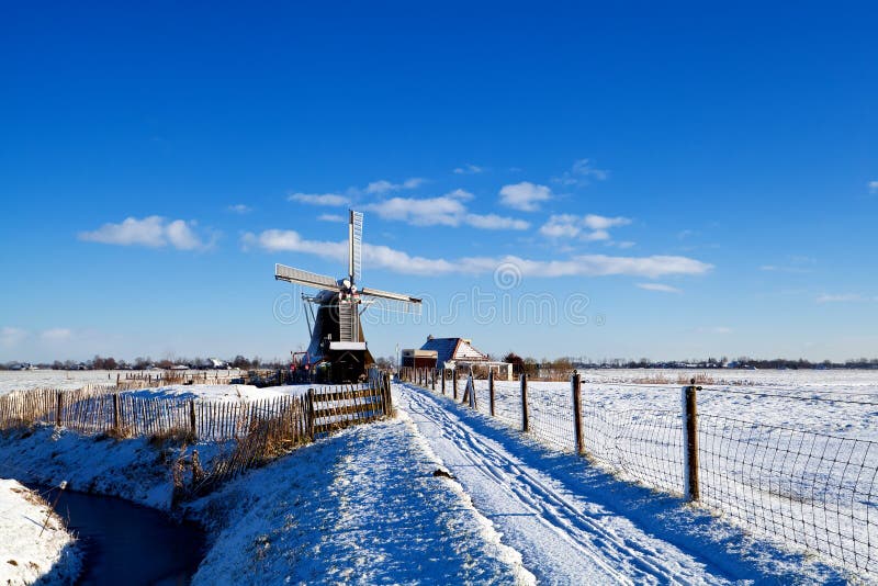 Windmill in the Snow stock photo. Image of farm, agriculture - 139962106