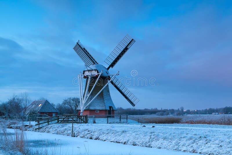 Windmill in the Snow stock photo. Image of farm, agriculture - 139962106