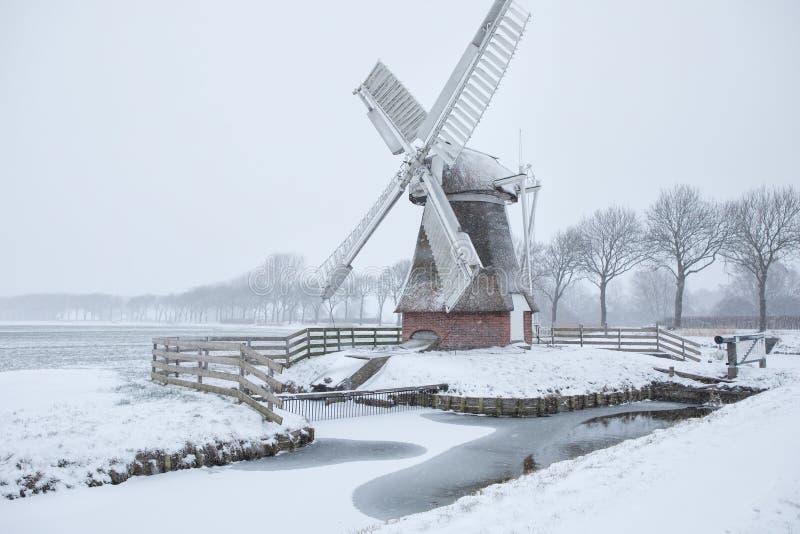 Windmill in the Snow stock photo. Image of farm, agriculture - 139962106