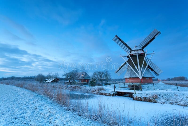 Dutch Windmill on Snow in Winter Dusk Stock Photo - Image of scenery ...