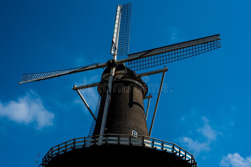 Dutch windmill in spring stock image. Image of landscape - 219000805