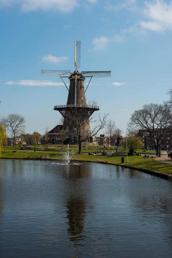 Dutch windmill in spring editorial stock photo. Image of leiden - 219000533