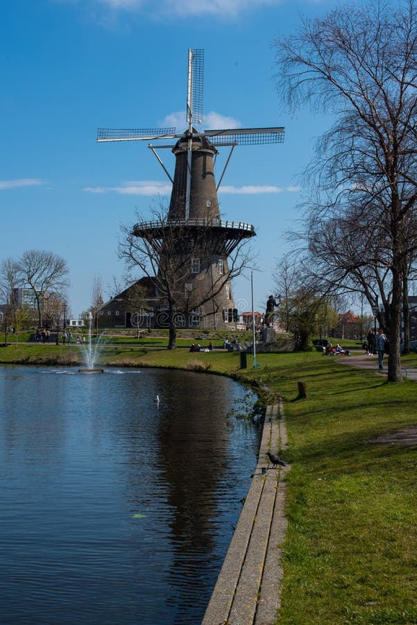 Dutch windmill in spring editorial photography. Image of nature - 219000612