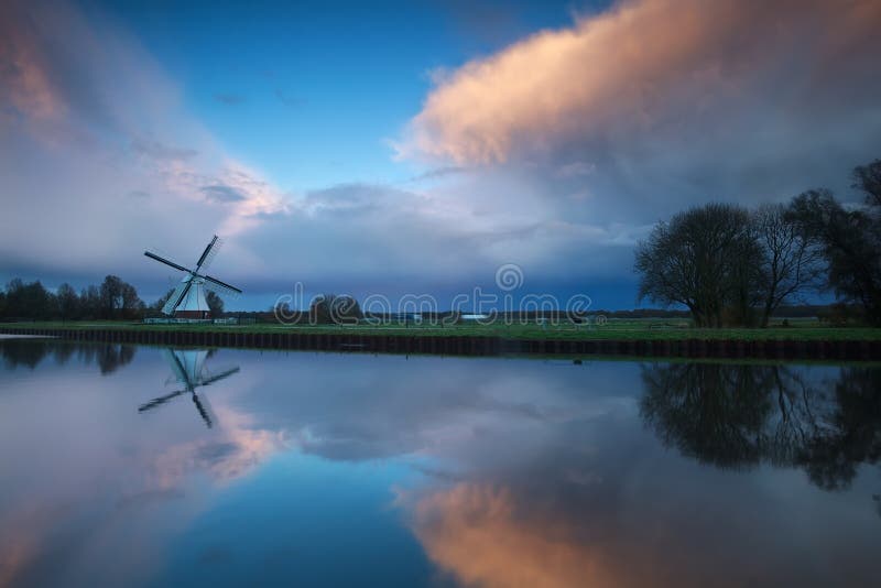 Sky and sunset in holland. stock image. Image of sunset - 138996651
