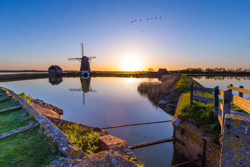 Dutch WindmIll during Sunset Stock Image - Image of rural, holland ...