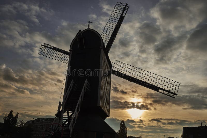Dutch windmill in sunset stock photo. Image of building - 226800644