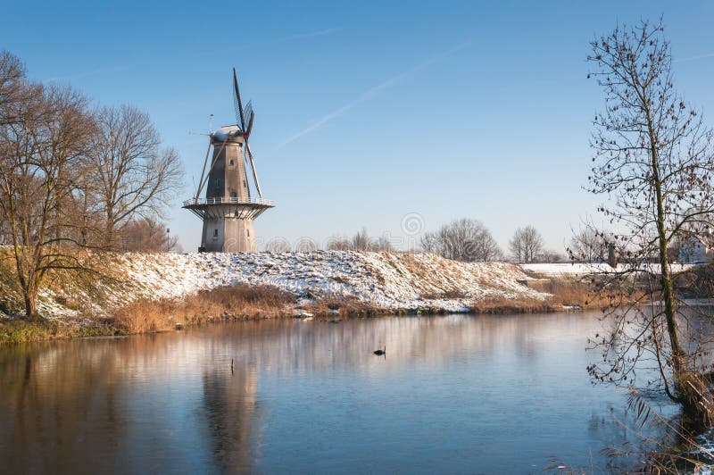 Dutch windmill in winter stock image. Image of europe - 28367269