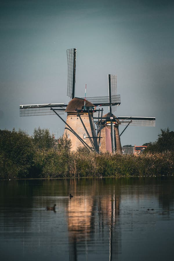 Dutch windmills editorial stock photo. Image of transport - 314668963